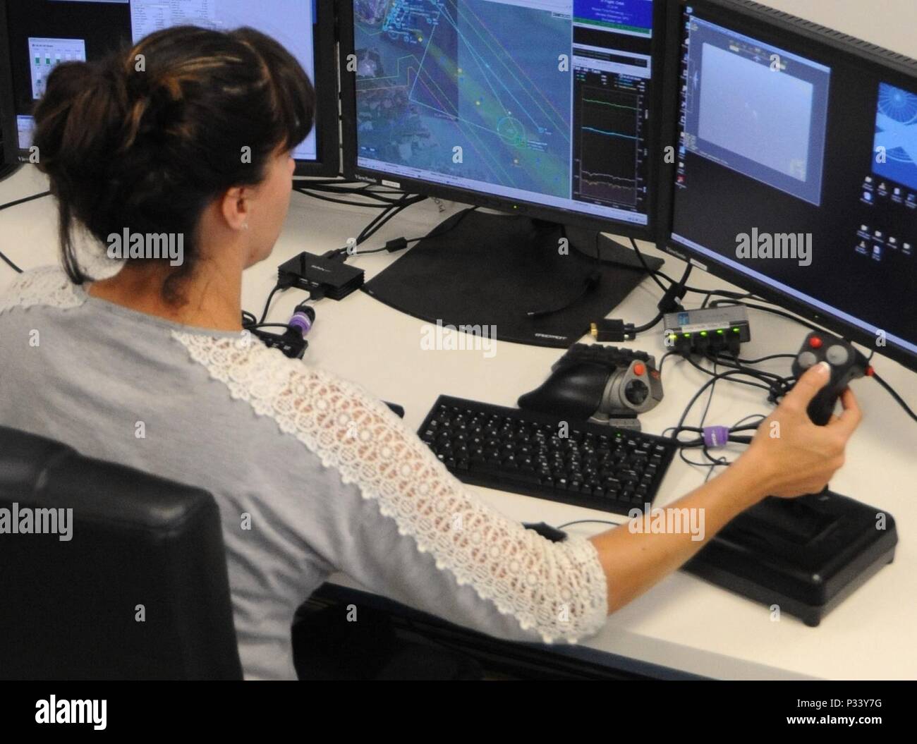 A Navy Scan Eagle unmanned aerial vehicle (UAV) operates during USS ...