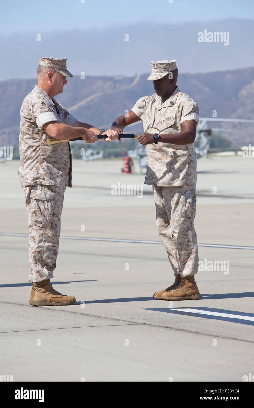 U.S. Marine Corps Sgt. Maj. Reginald Robinson receives the ...