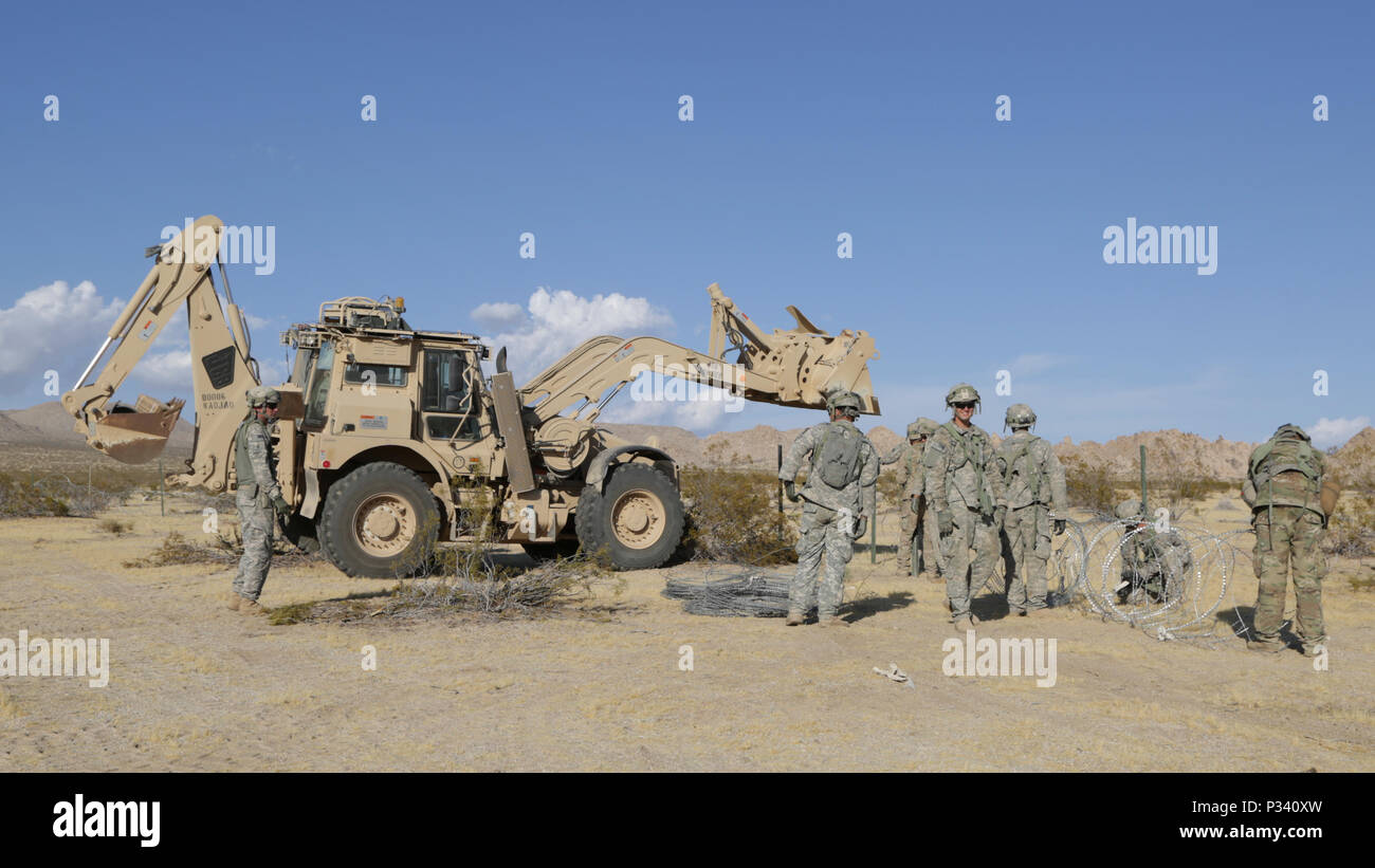 U.S. Soldiers assigned to 588th Engineer Battalion sets up obstacles ...
