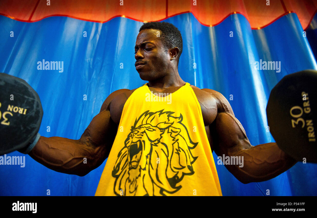 Senior Airman Terrence Ruffin, 16th Electronic Warfare Squadron, flexes ...