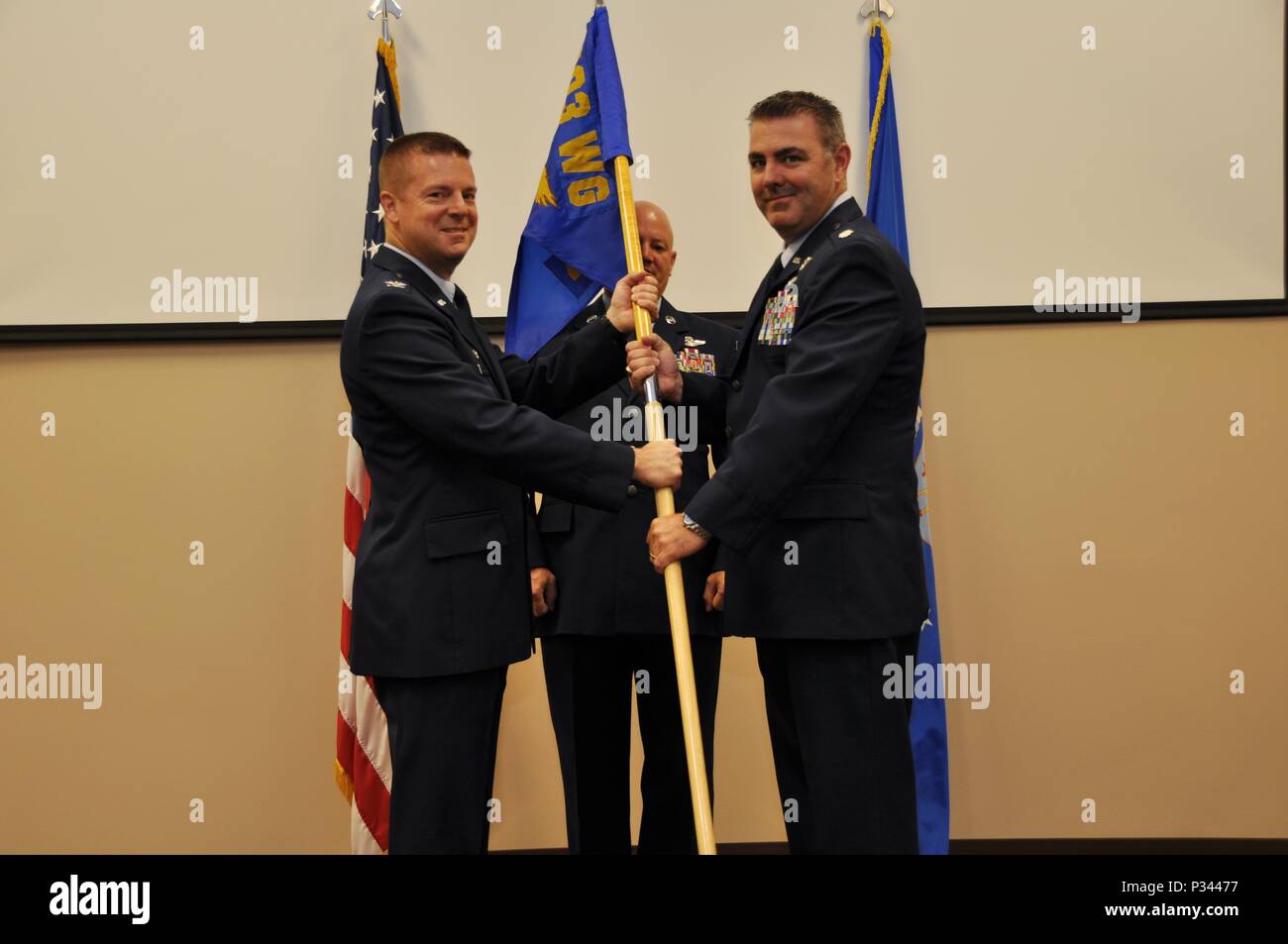 Col. Frank L. Amodeo, 403rd Wing commander, passes the 403rd Operations ...