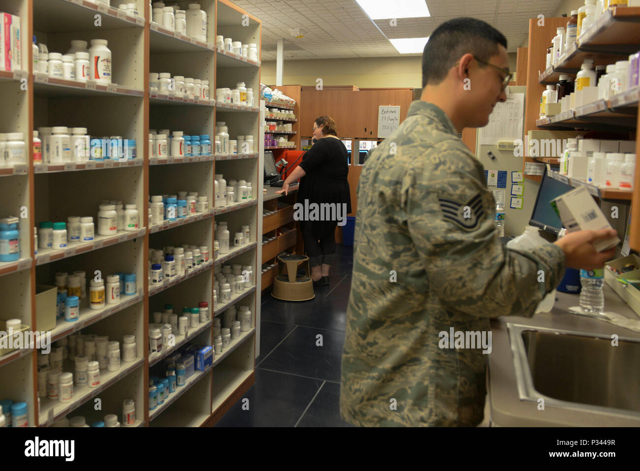 Pharmacists complete on-duty tasks at Minot Air Force Base, N.D., Aug ...