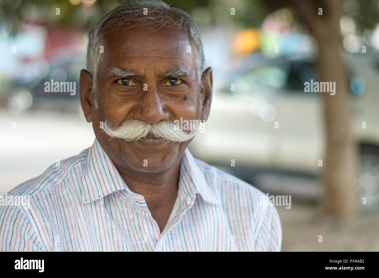 Man in the streets of Gurgaon, India Stock Photo - Alamy