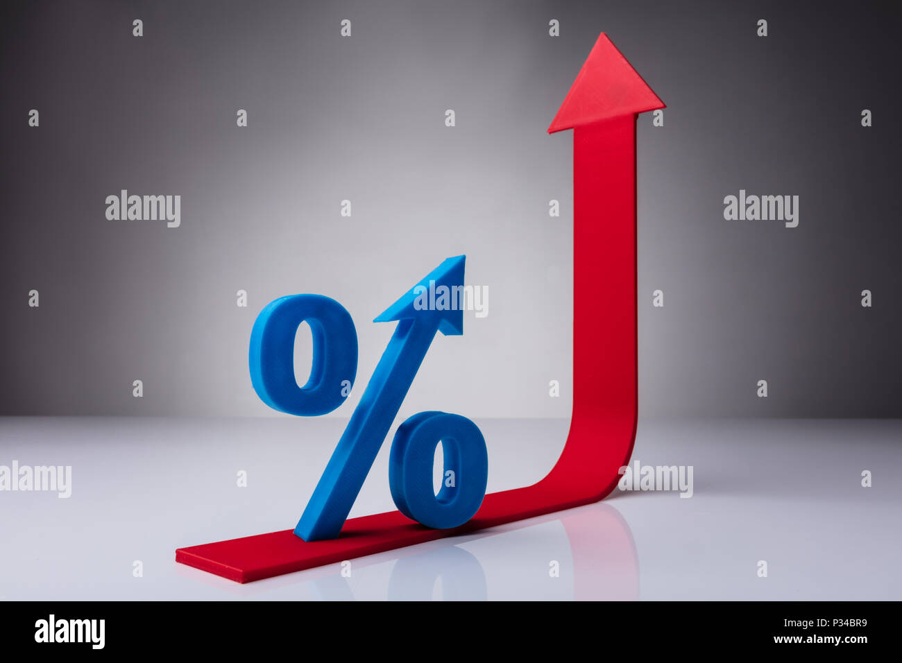 Close-up Of Blue Percentage Symbol On Red Arrow Pointing Upwards Stock ...