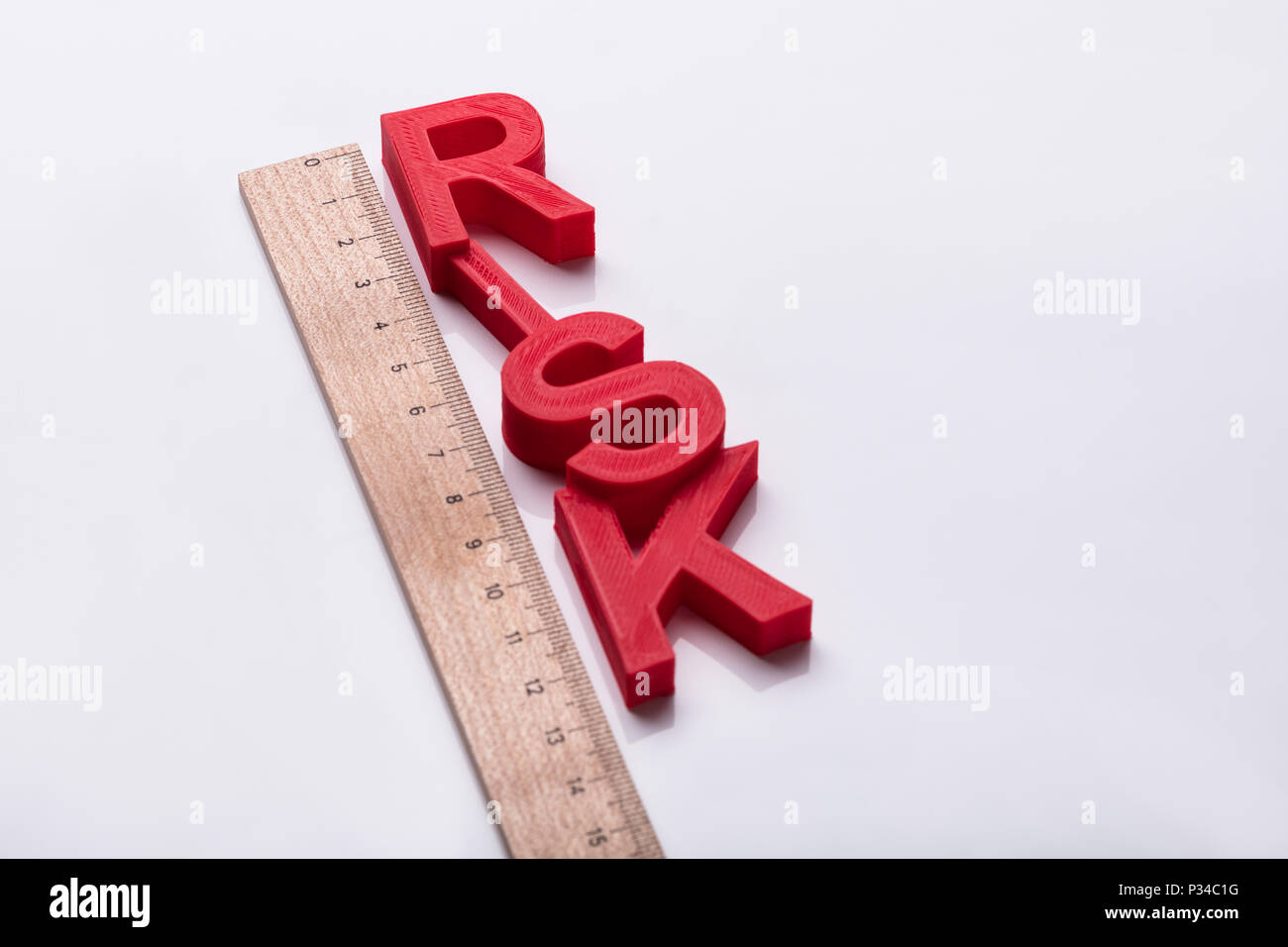 Elevated View Of Red Risk Word And Wooden Ruler On White Background ...
