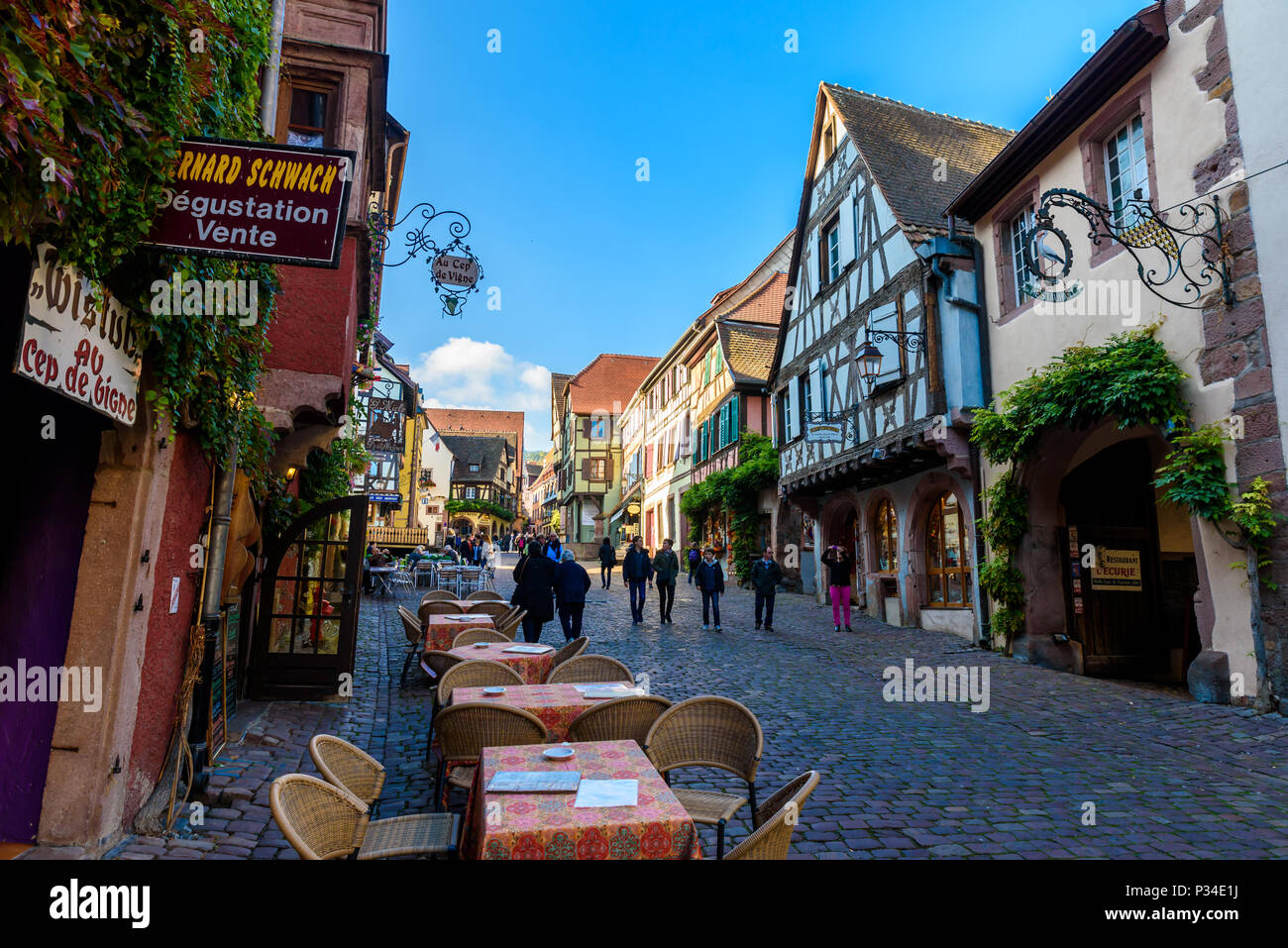 Beautiful village Riquewihr with historic buildings and colorful houses ...
