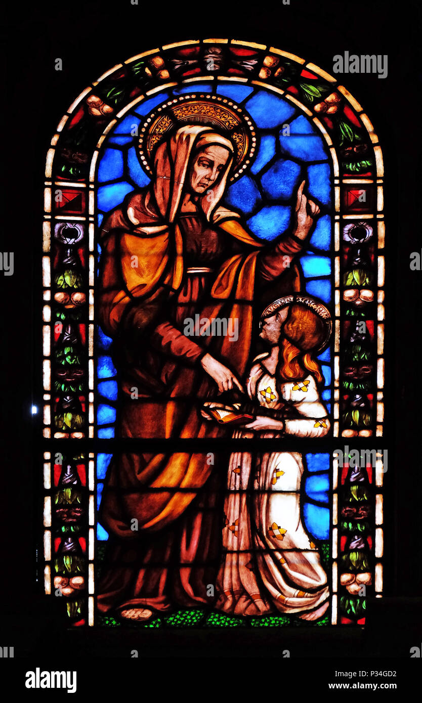 Saint Anne, stained glass window in the Santi Paolino e Donato church ...