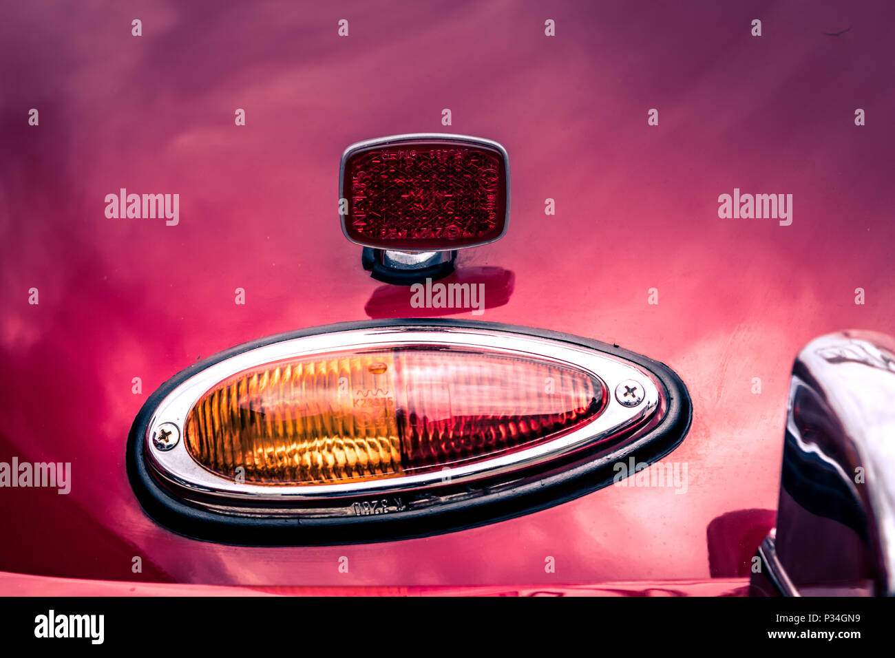 Close-up, detailed photo of the trunk and rear lamp of a classic ...