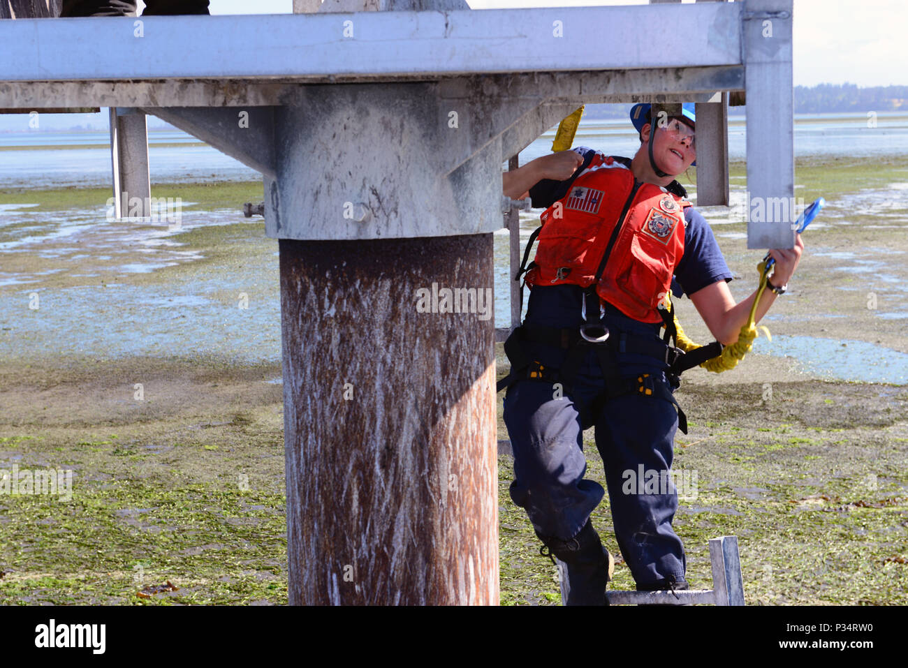 Coast Guard Petty Officer 2nd Class Kelly Yost, an electrician's mate ...