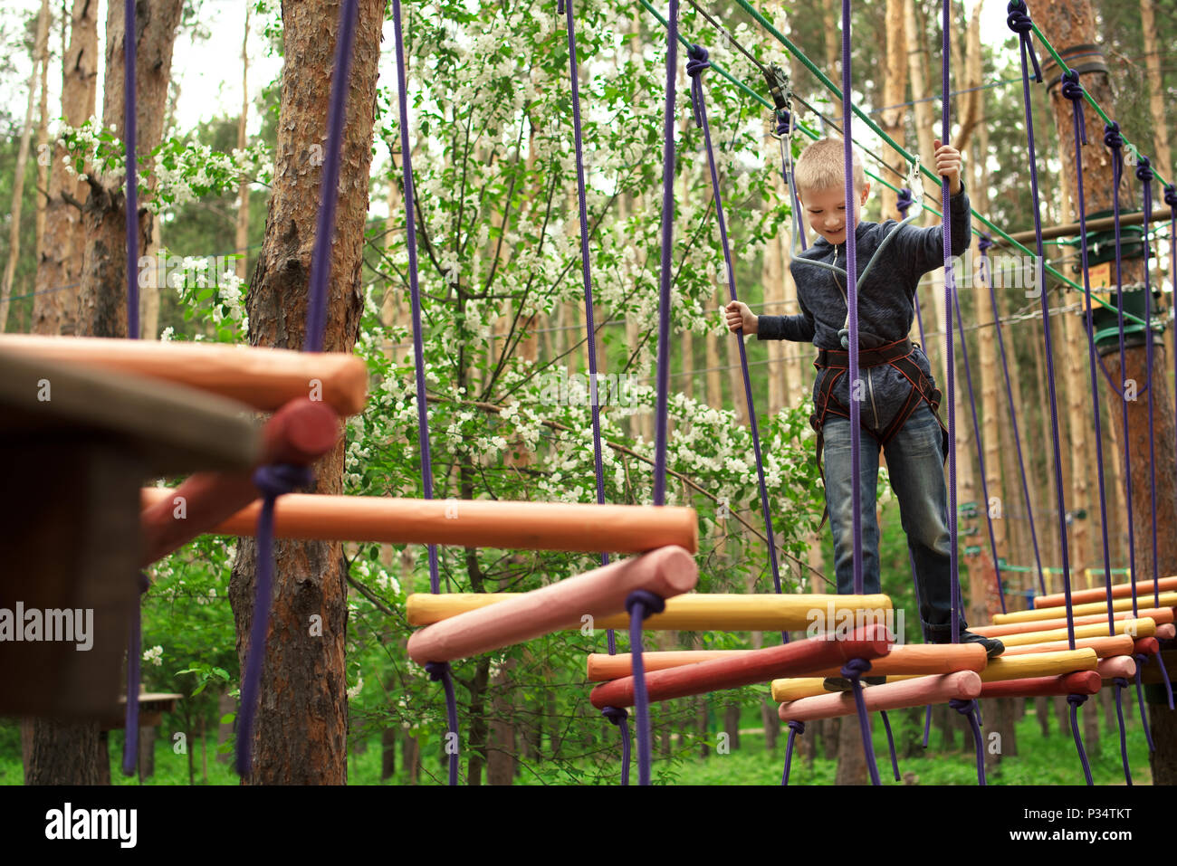 Kids climbing adventure park hi-res stock photography and images - Alamy