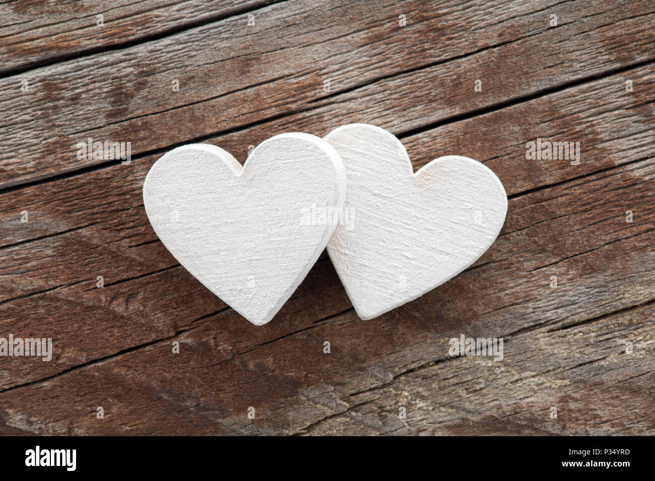Heart wooden symbol two hi-res stock photography and images - Alamy