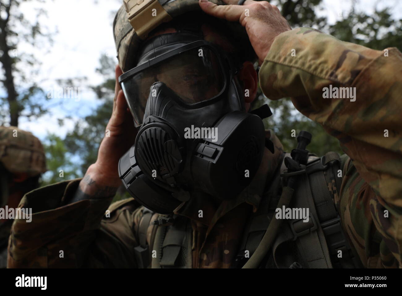 Warrior removes his gas mask in preparation for day four mystery event ...