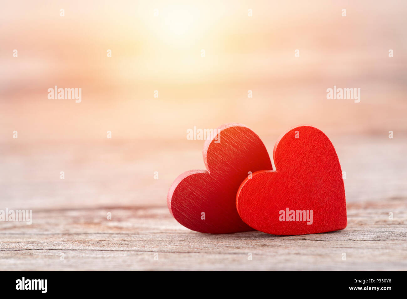 Two hearts on red hi-res stock photography and images - Alamy