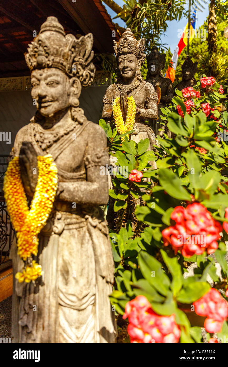 Statues at the entrance to Vihara Dharma Giri, Buddhist temple in the ...
