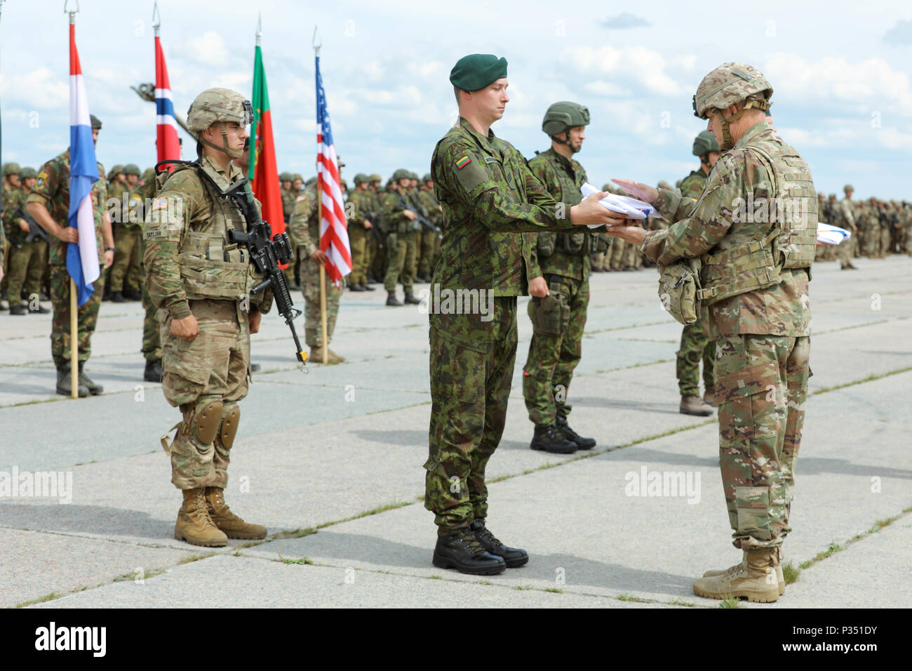 The Saber Strike 18 exercise colours are presented to Brig. Gen ...
