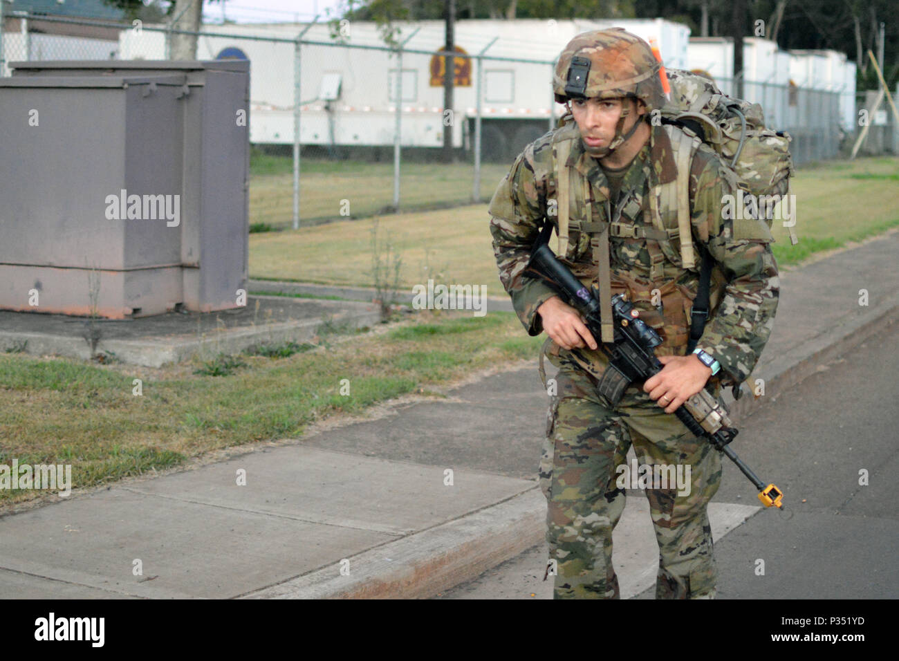A Soldier assigned to the 25th Infantry Division nears the end of a 12 ...