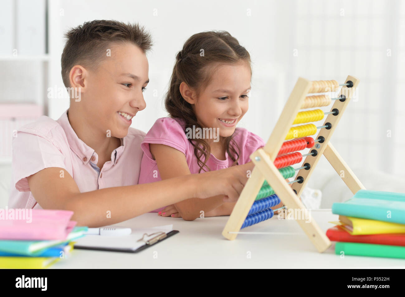 little girl counting on abacus Stock Photo - Alamy