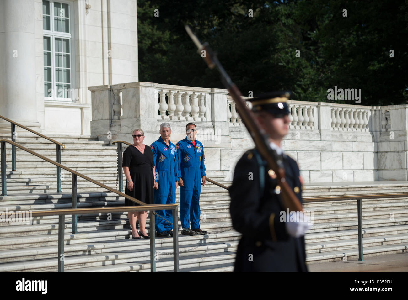 NASA astronauts Mark Vande Hei (center) and Joe Acaba (right) watch the ...