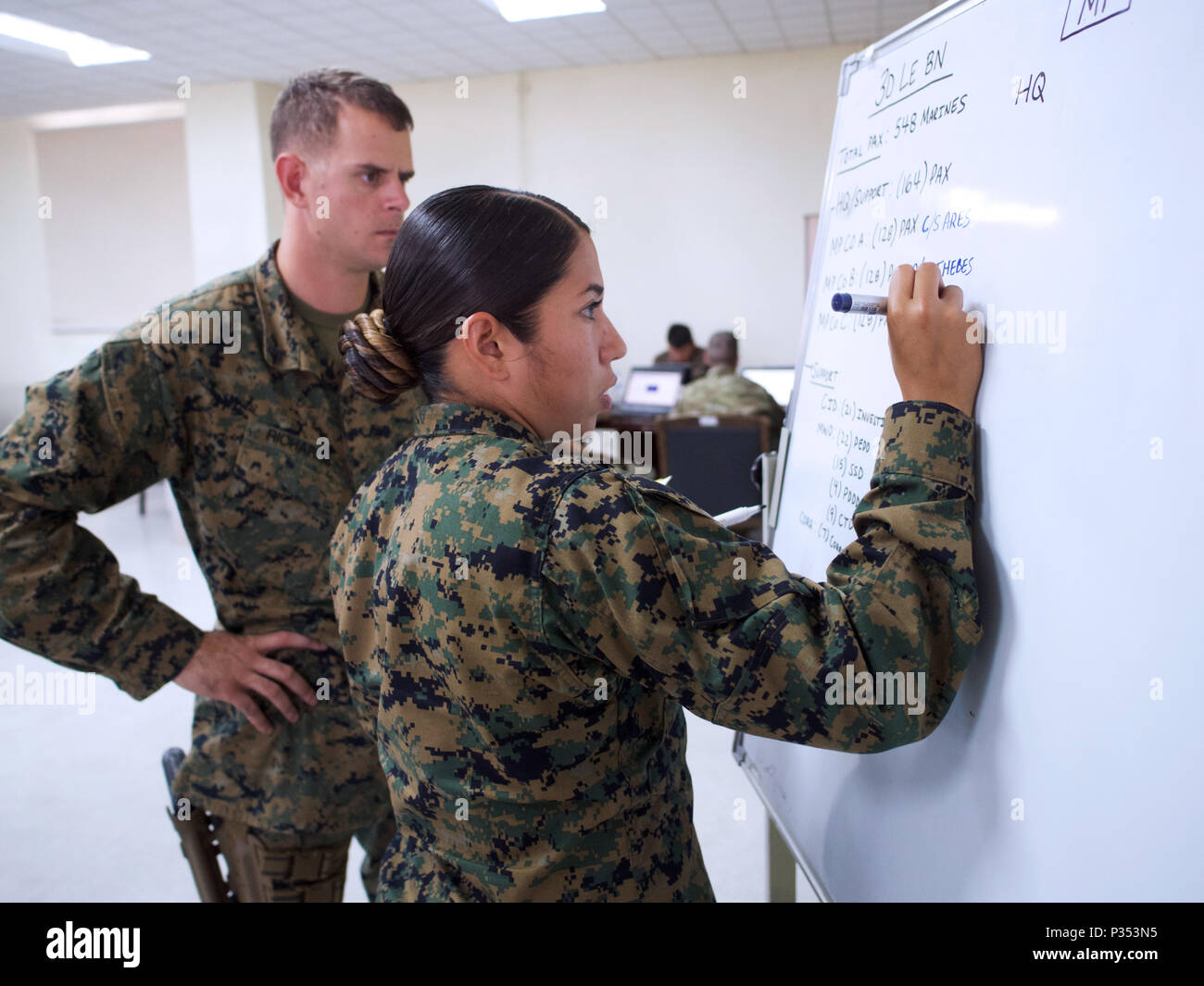 Marine 1st Lt. Jennifer Galvan and Cpl. Thomas Richards, both of the ...