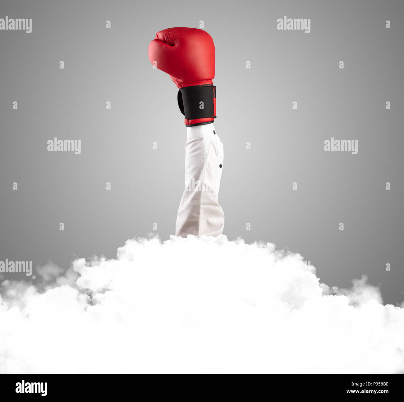 Hand breaking out from the cloud Stock Photo - Alamy