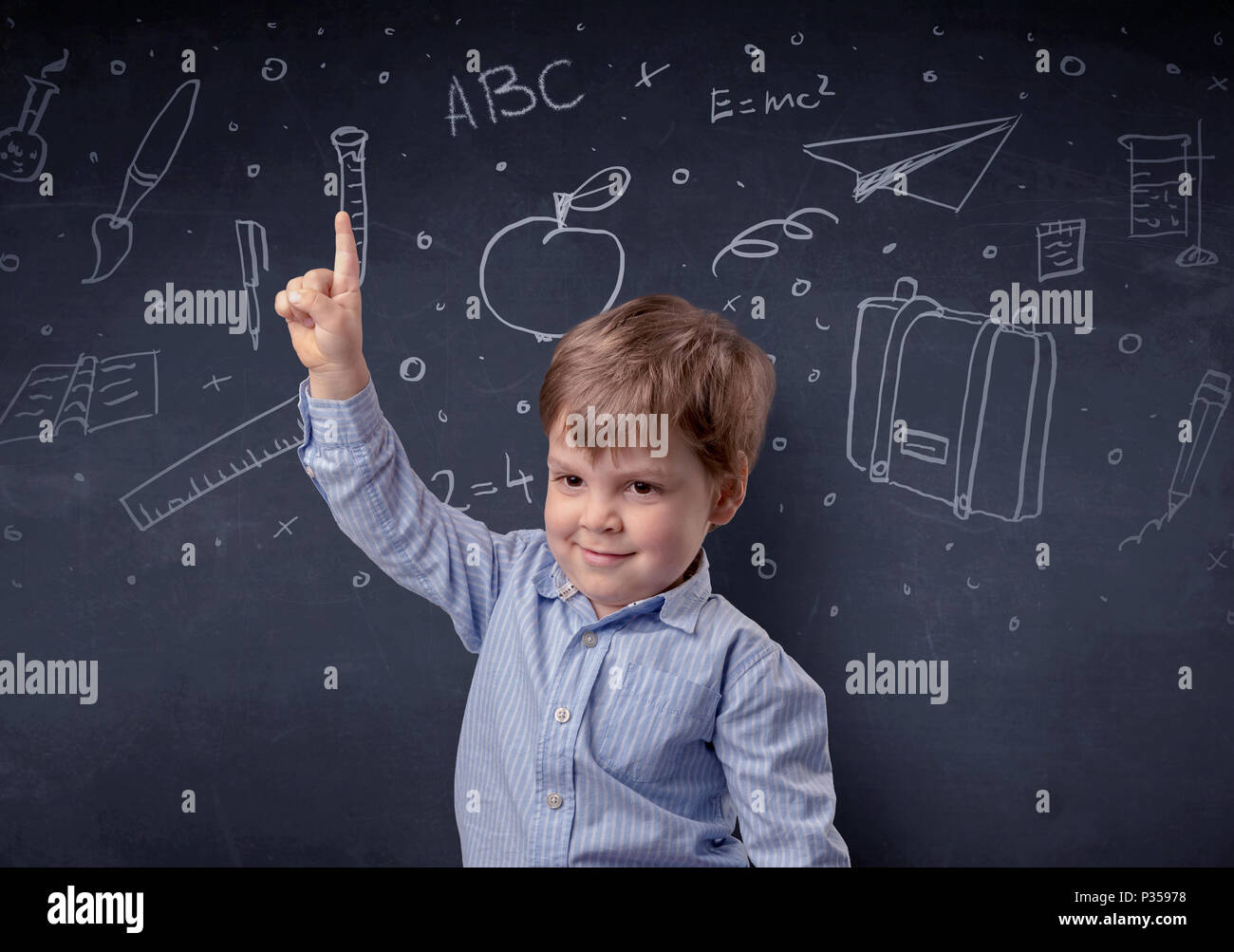 Smart little kid in front of a drawn up blackboard ruminate Stock Photo ...