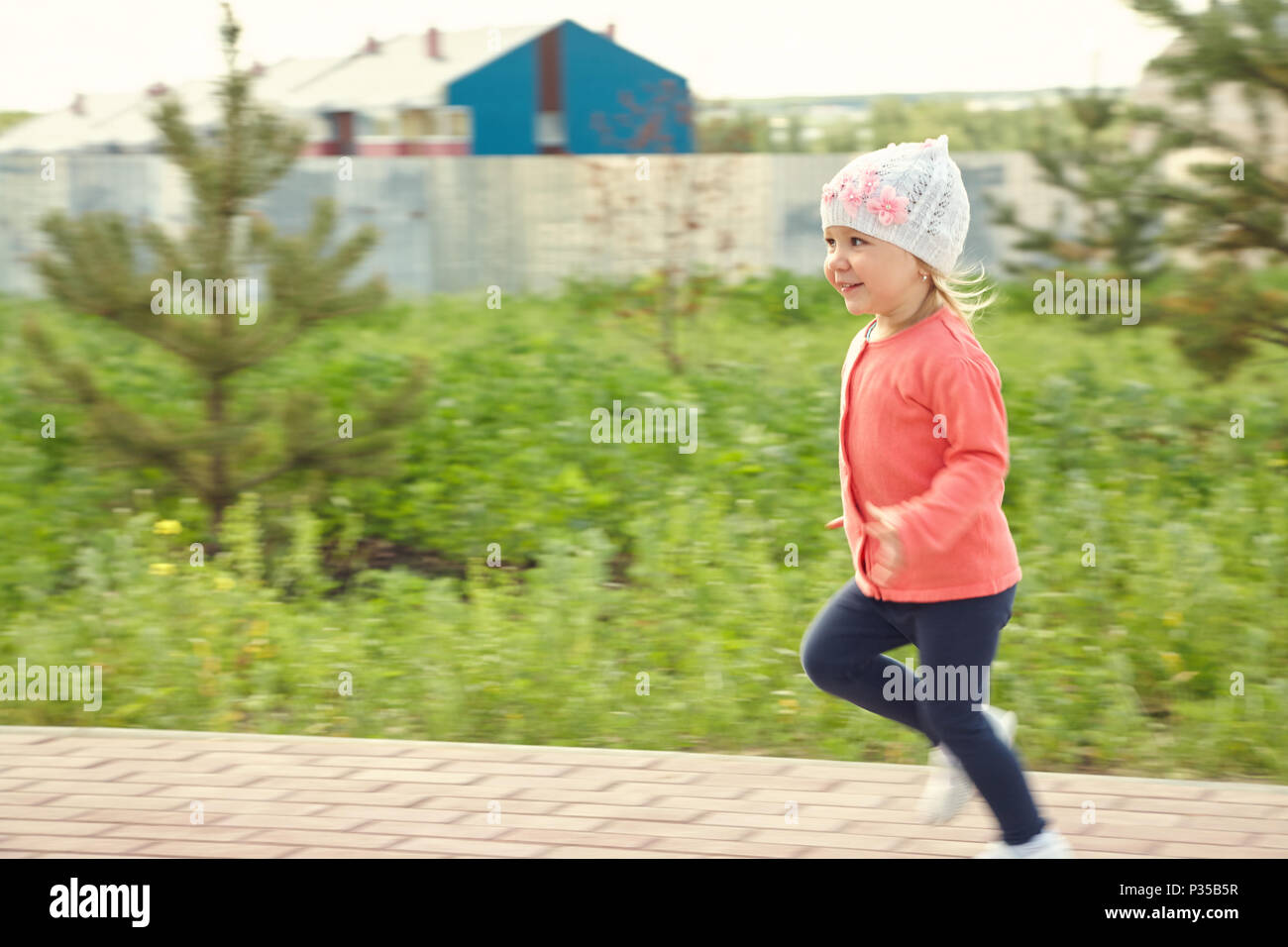 Little child running Stock Photo - Alamy
