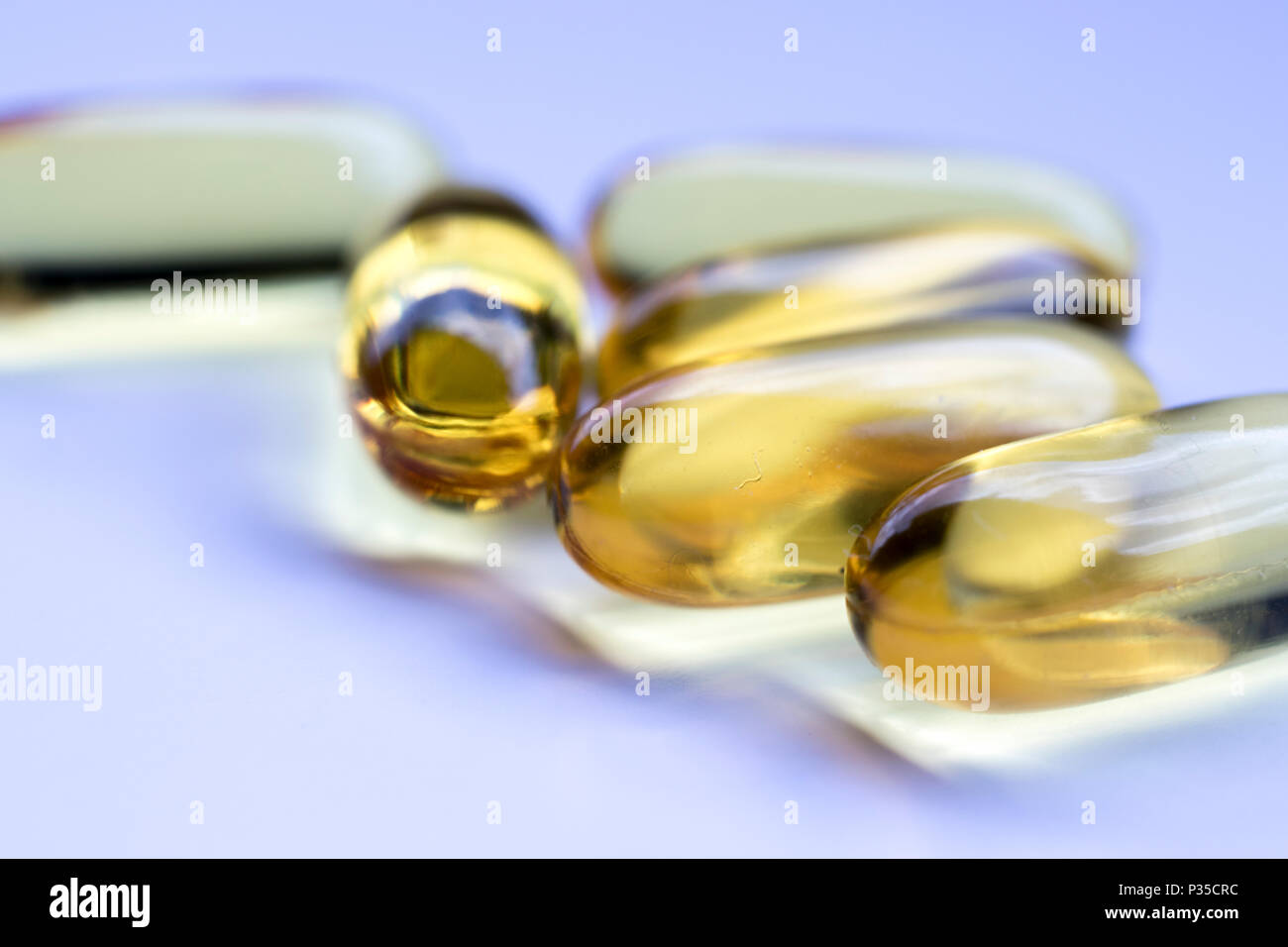 Cod fish liver oil capsules vitamin and mineral health and healthy ...