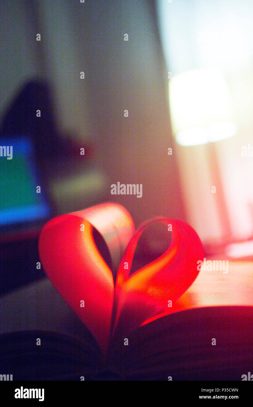 Heart shape made from book pages hi-res stock photography and images ...