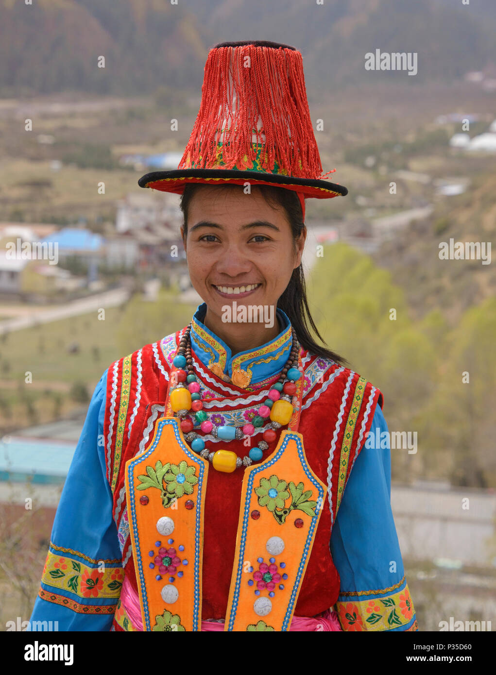 Traditional dress of the Yugur ethnic minority, Mati Si, Gansu, China ...