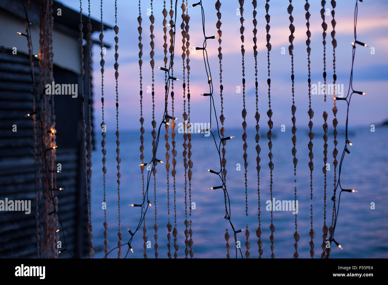 Strings seashells hi-res stock photography and images - Alamy