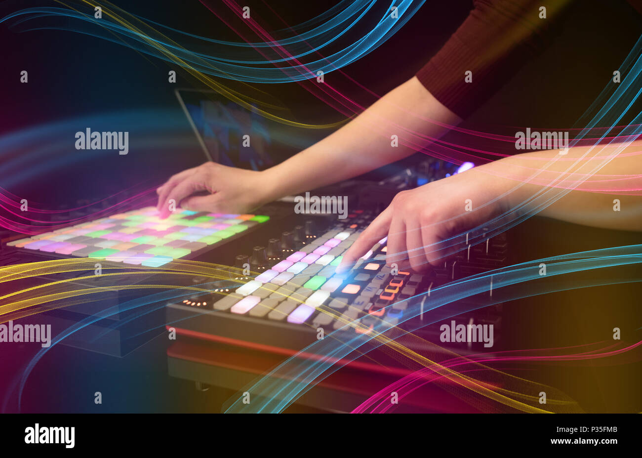 Hand mixing music on dj controller with colorful vibe concept Stock ...