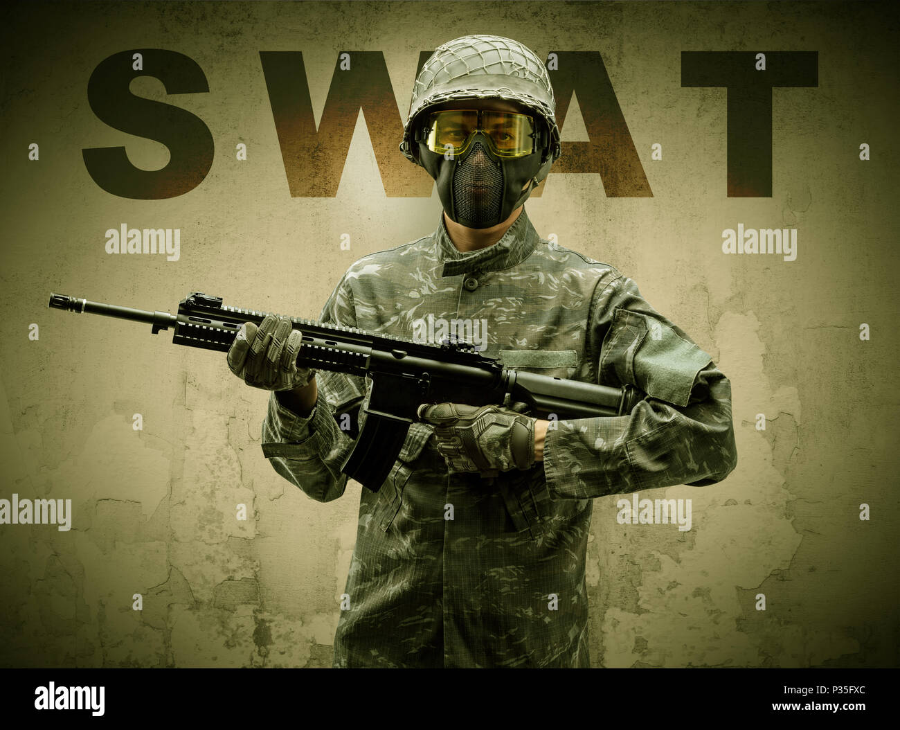 Uniformed armed soldier with damaged wall background Stock Photo - Alamy