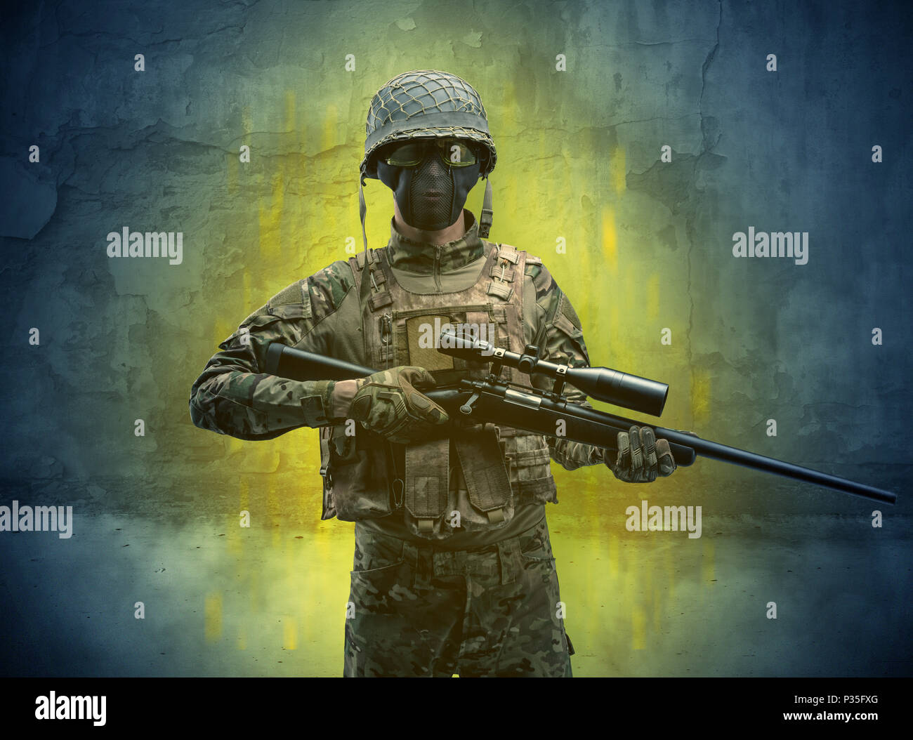 Hazard, menace soldier in a ruined crumbly building with arms on his ...