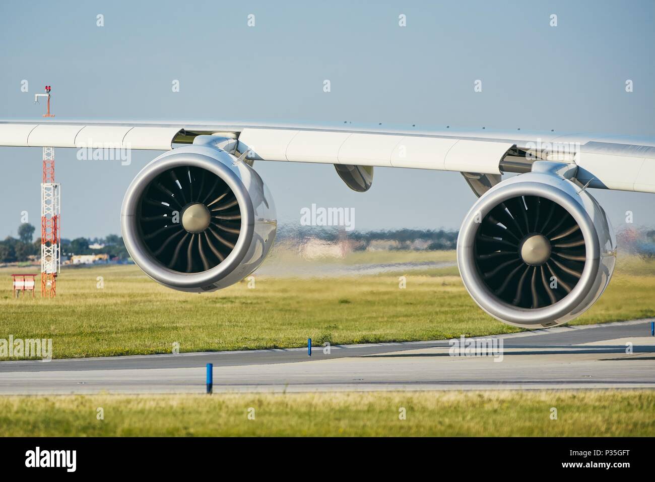 Engines of the huge airplane on the airport runway Stock Photo - Alamy
