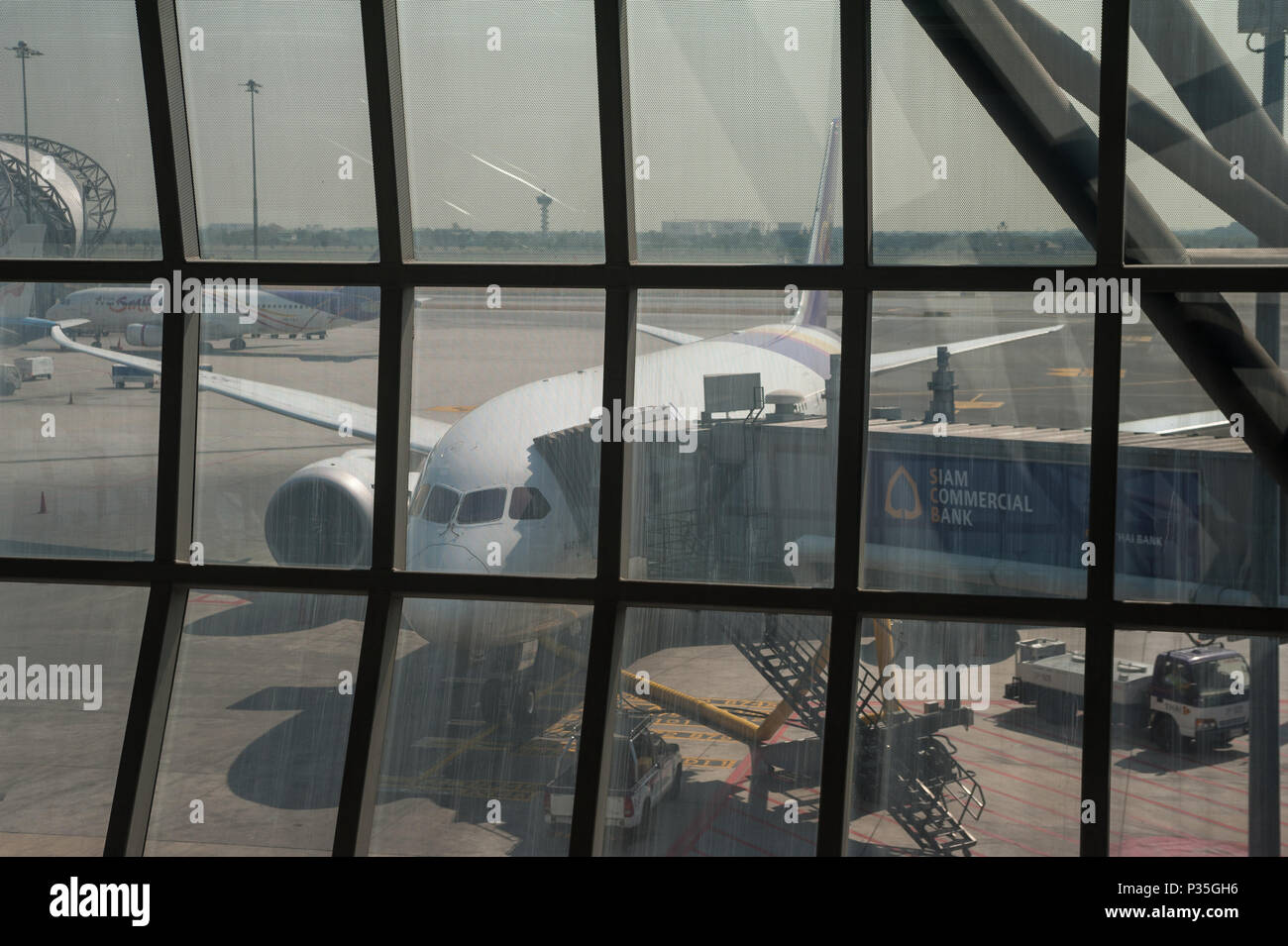 Bangkok, Thailand, a plane at a gate at Bangkok airport Stock Photo - Alamy