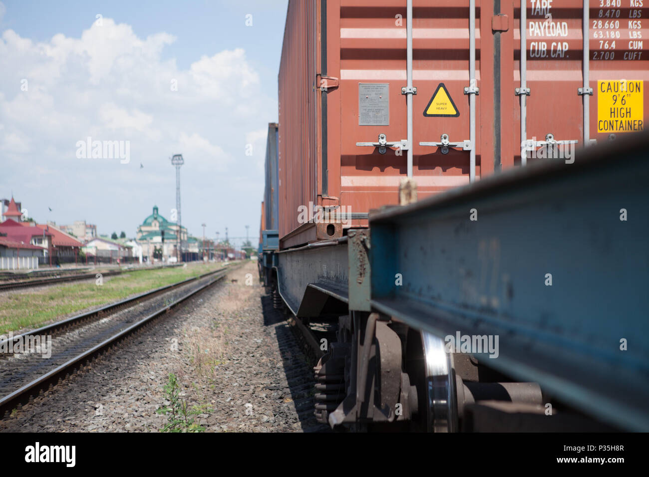 Container loaded on train wagons on a railway Stock Photo - Alamy