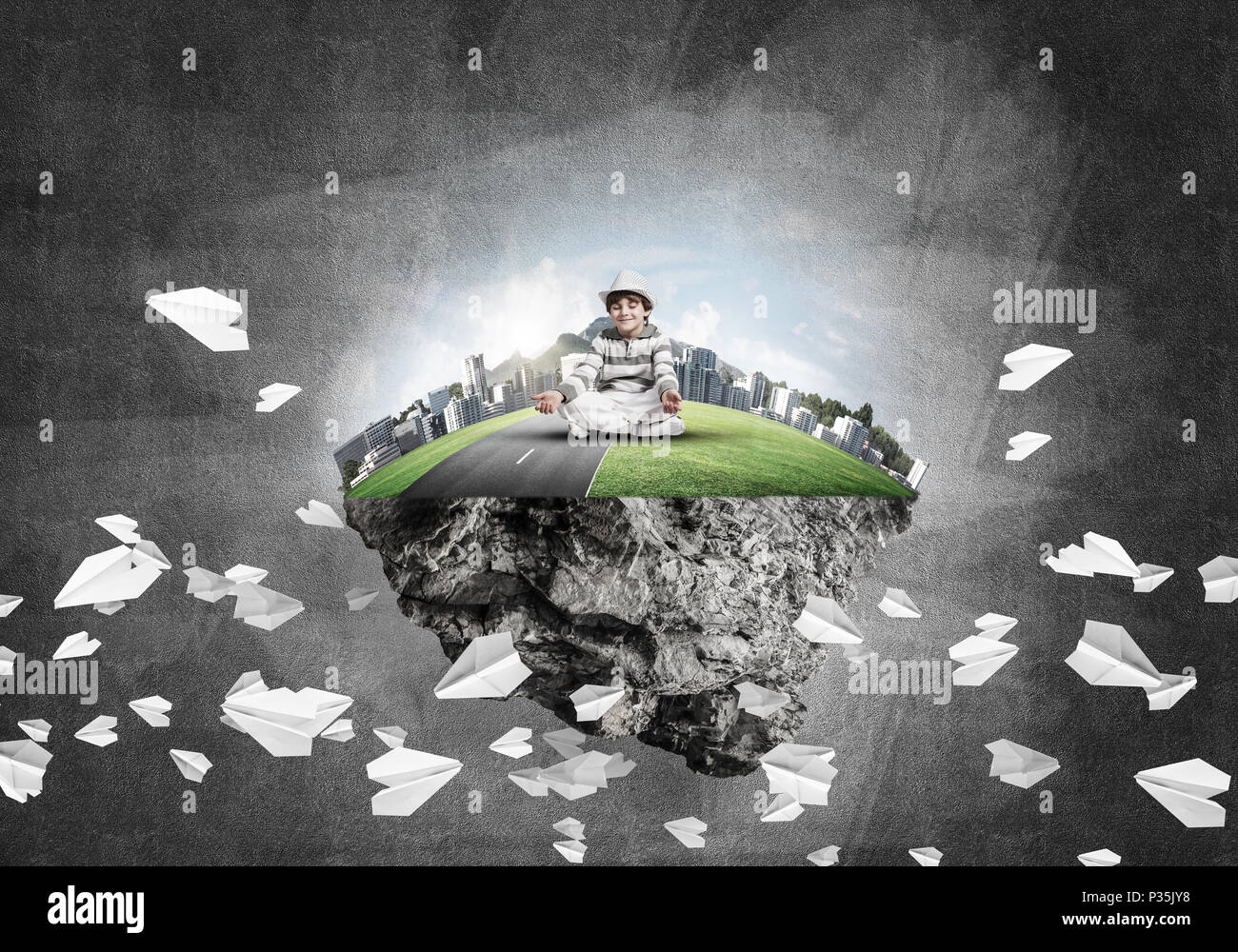 Little boy keeping mind conscious Stock Photo - Alamy
