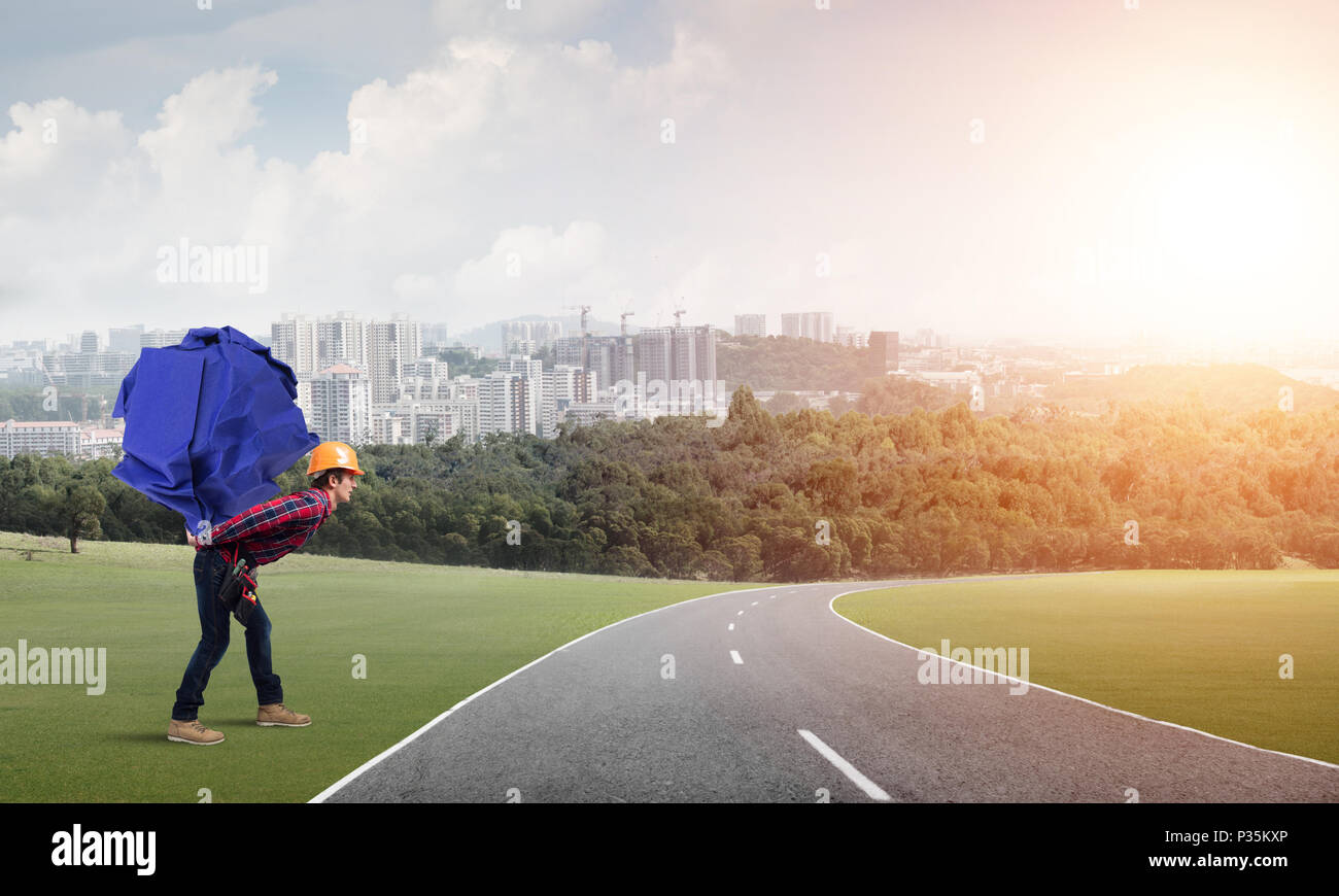 Engineer man carry load Stock Photo - Alamy