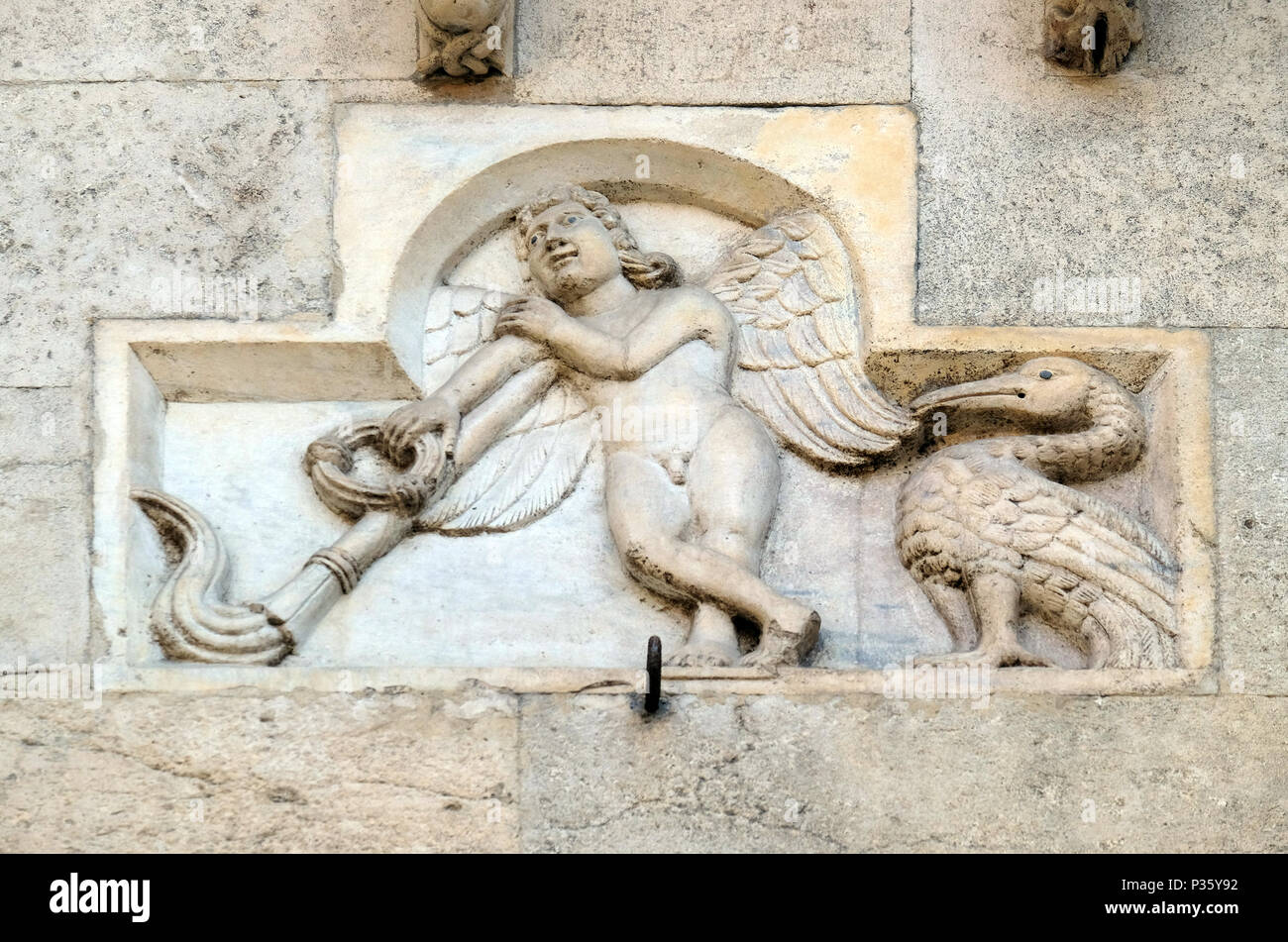 Genio Funerario with upside-down torch (around 1099), bass-relief by ...