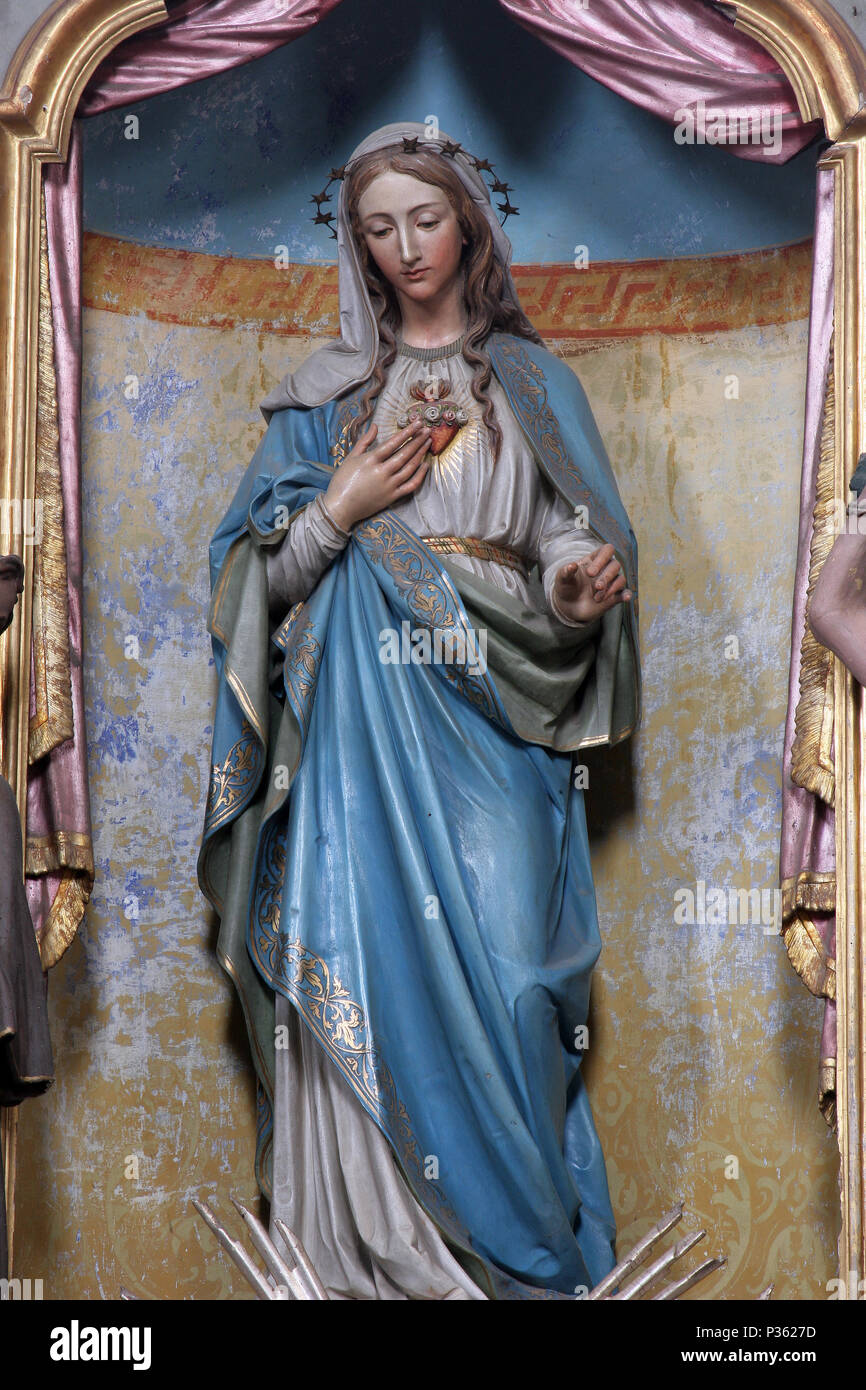 Virgin mary heart hi-res stock photography and images - Alamy