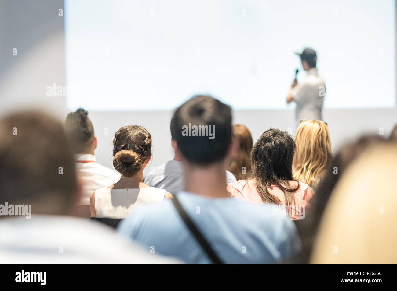 Business speaker giving a talk at business conference event Stock Photo ...