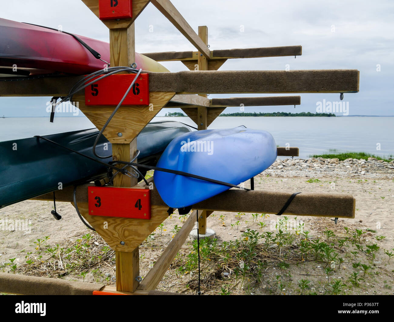 Stand with kayaks on beach Stock Photo - Alamy