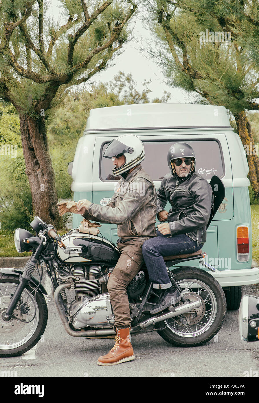 Biarritz, France-June 16,2018: Biker friends with his motorcycle in the ...