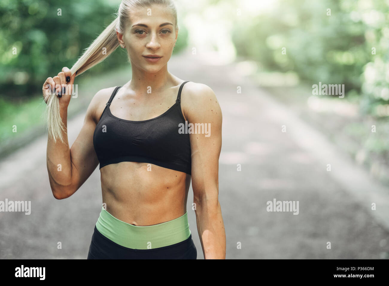Young Woman Running. Beautiful fit Girl. Fitness model outdoors. Weight ...