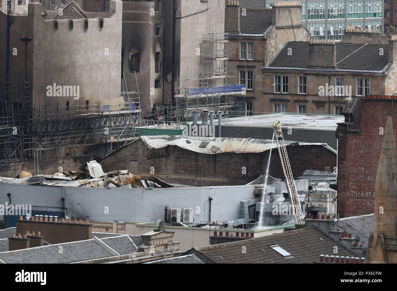 Dampen down following fire glasgow school art gsa hi-res stock ...