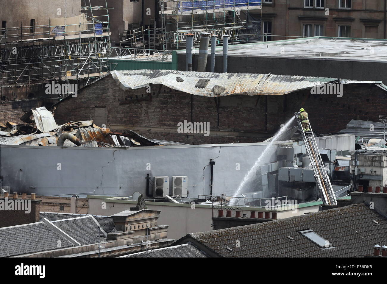 Dampen down following fire glasgow school art gsa hi-res stock ...
