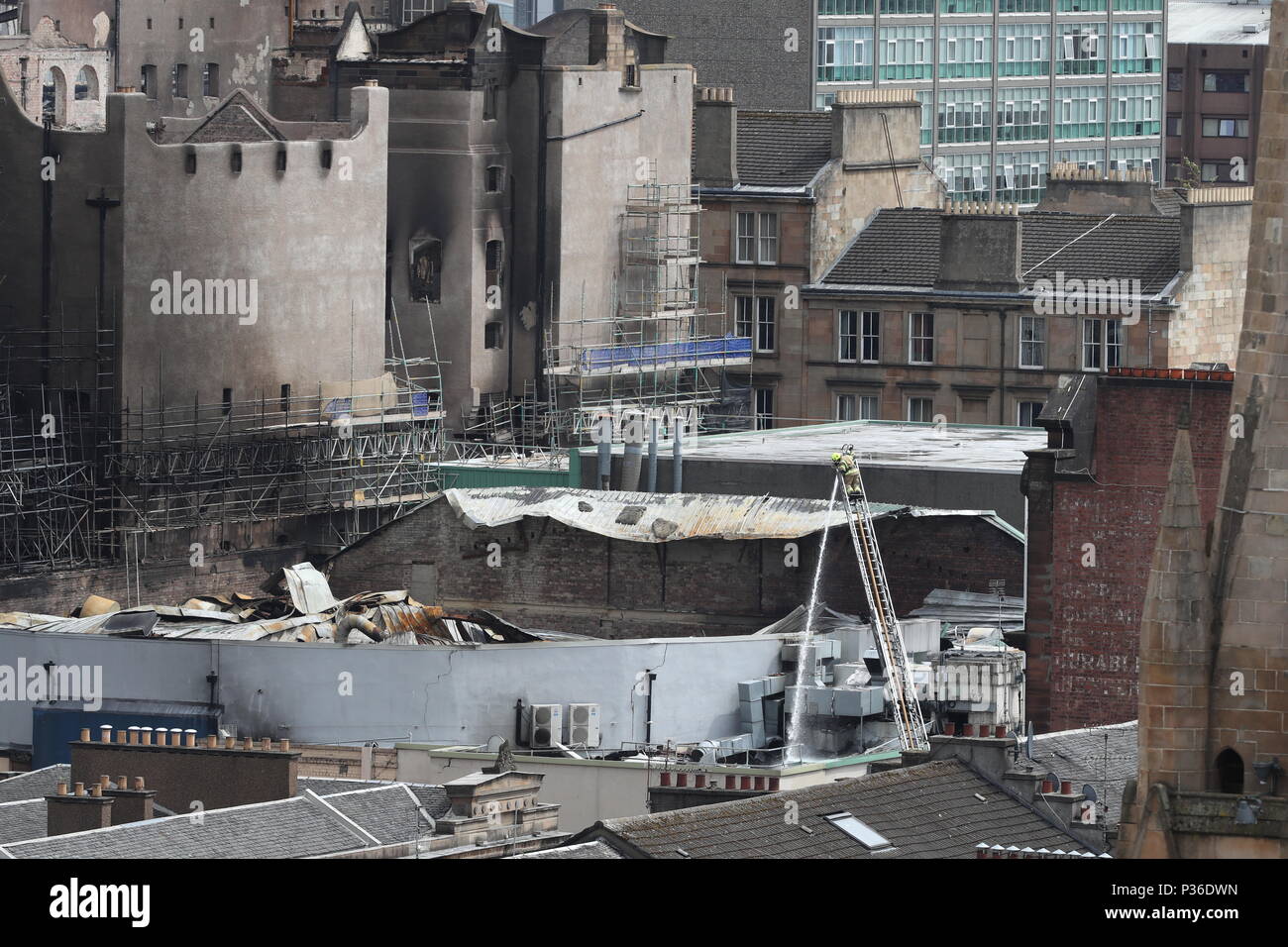 Dampen down following fire glasgow school art gsa hi-res stock ...
