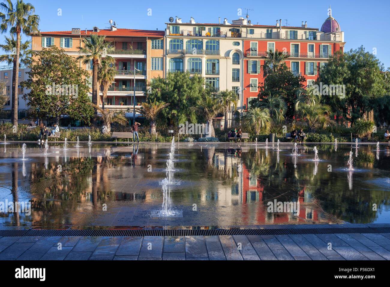 France, Nice, apartment buildings at Promenade du Paillon with fountain ...