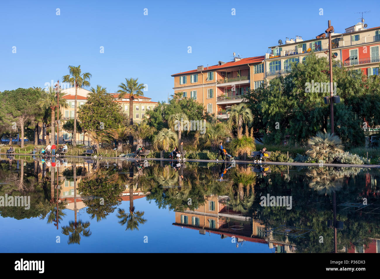 France, Nice, apartment buildings at Promenade du Paillon with fountain ...