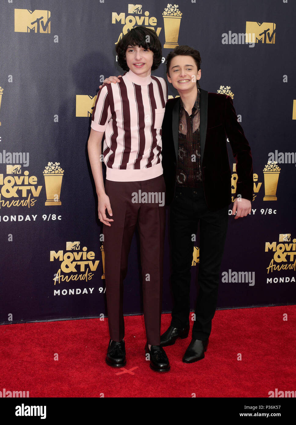 Finn Wolfhard, left, and Noah Schnapp attending the 2018 MTV Movie and ...